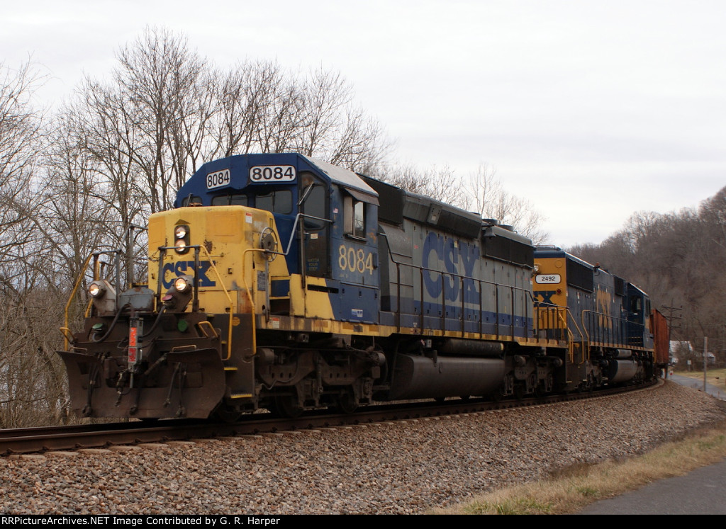 597 - CSXT 8084 westbound on a short ballast train